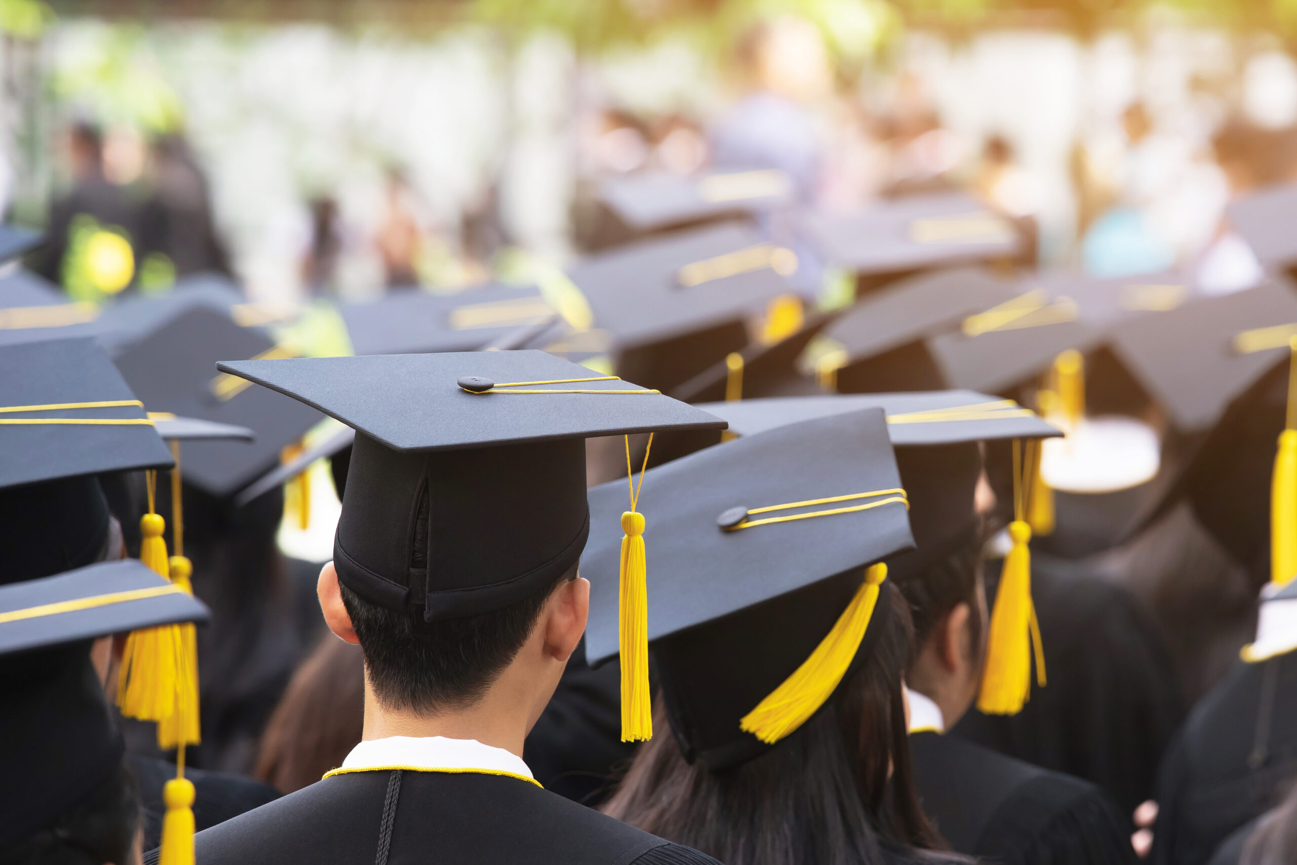 shot of graduation hats during commencement success graduates of the ...